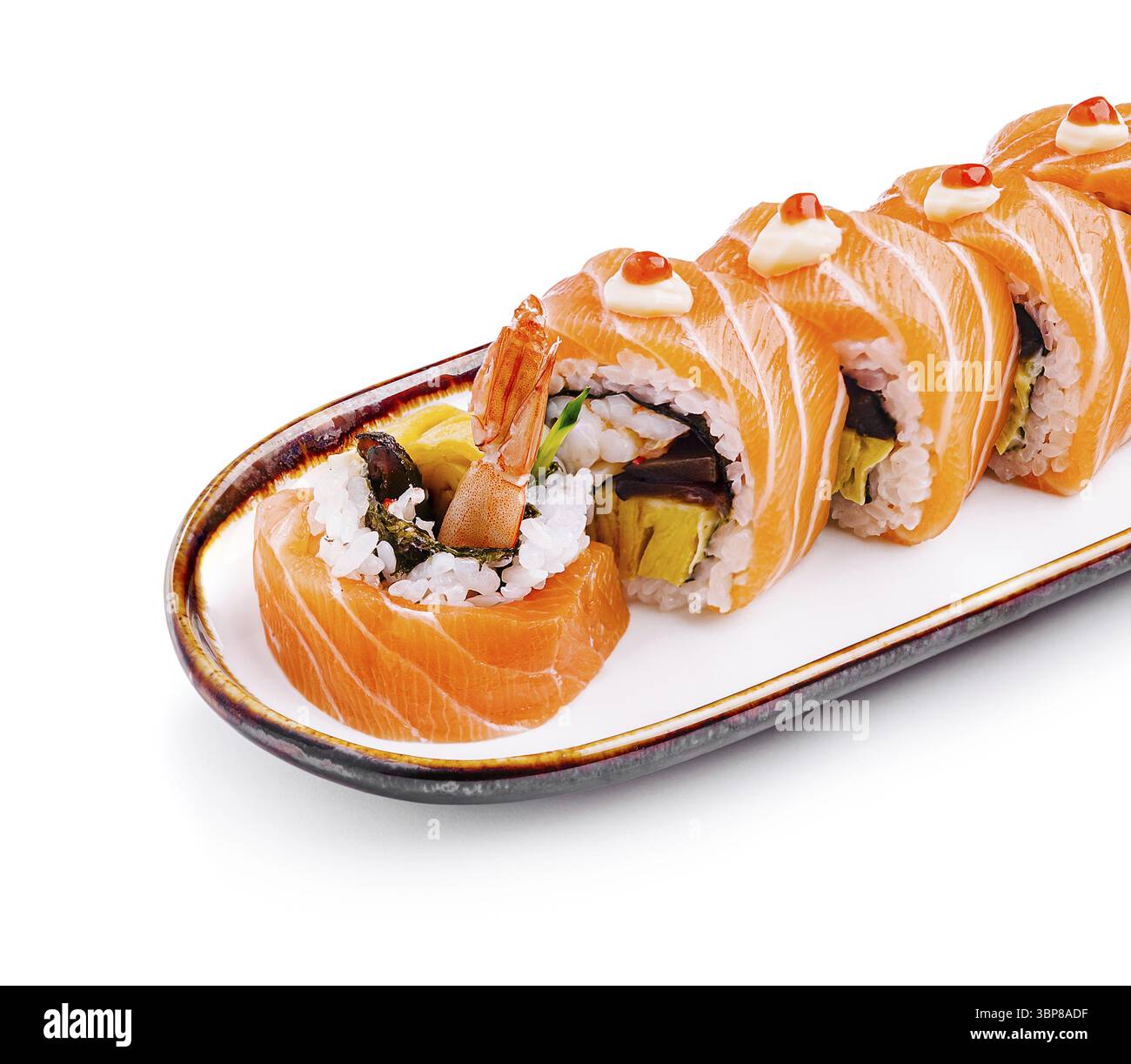 Food, An assortment of sushi rolls showcases layers of fresh fish ...