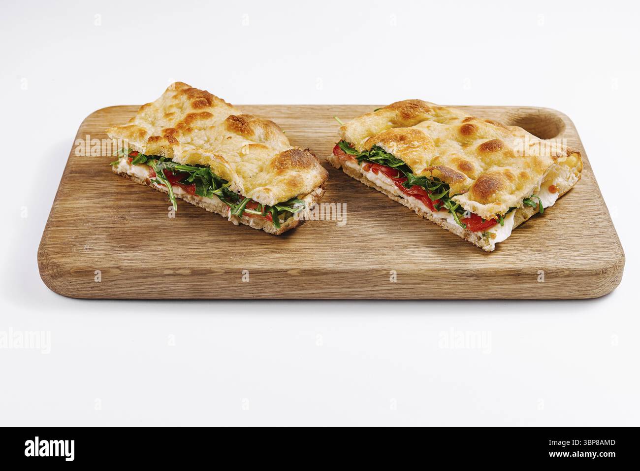 Food, Sliced italian panini with vegetables and cheese on a cutting ...