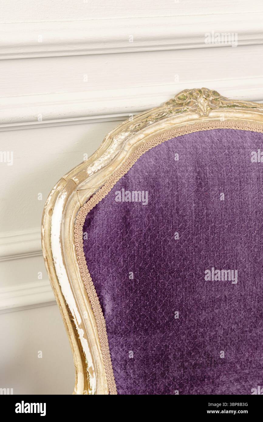 Purple Vintage classical farbirc style Chair indoors Stock Photo - Alamy