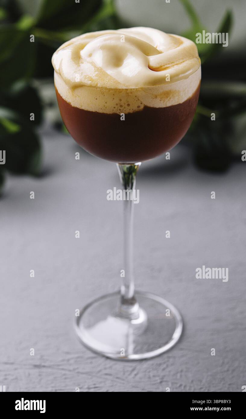 Food, Gourmet espresso martini cocktail with a creamy foam, served in a ...