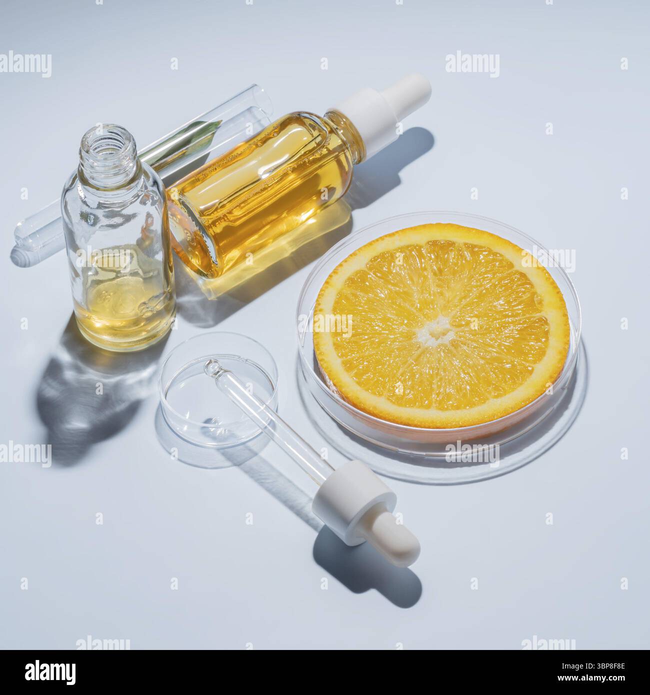 Cosmetic laboratory experiment and research with orange and ingredient ...