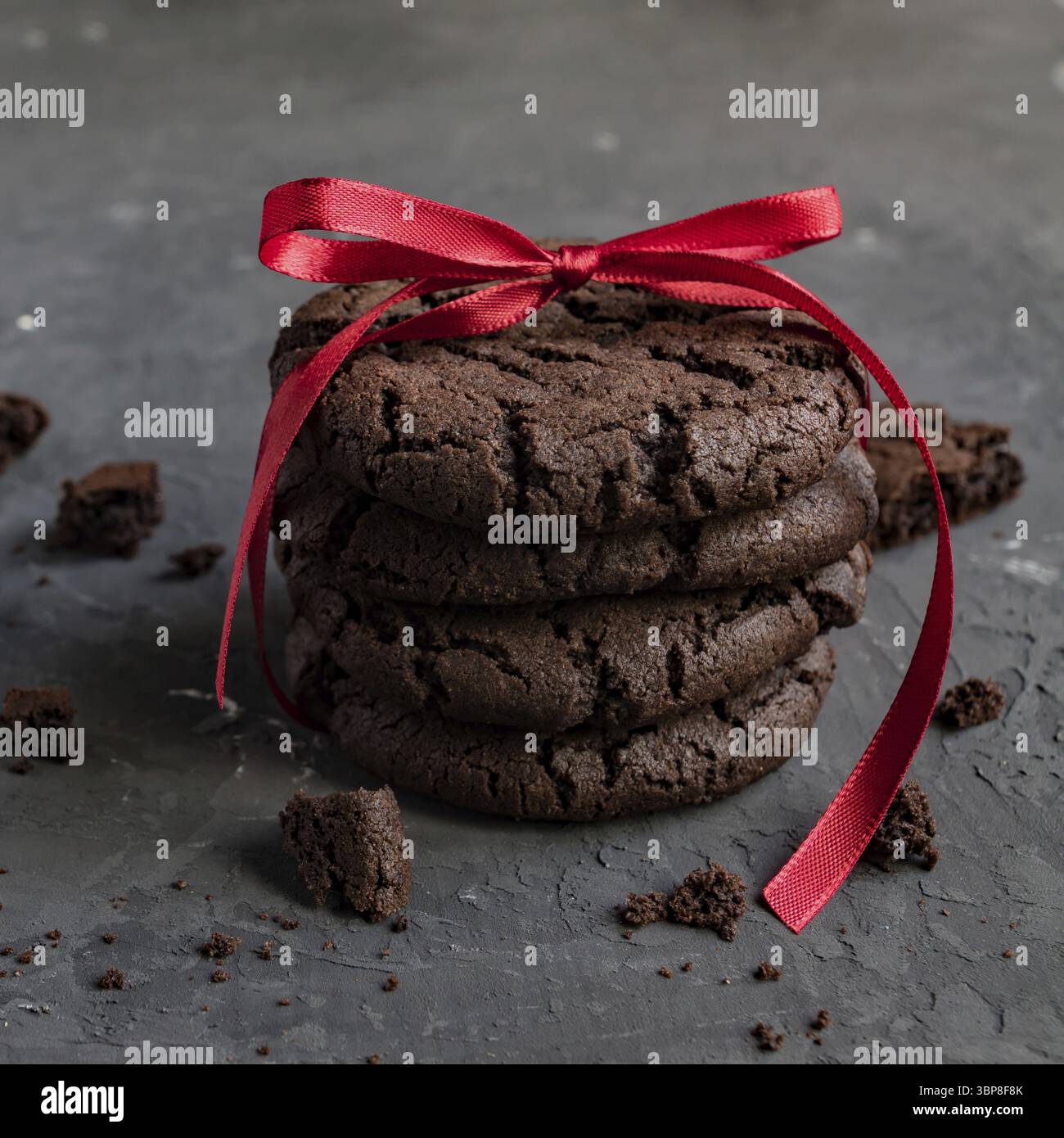 Tall stack of soft homemade chocolate chip cookies with a bite mark ...