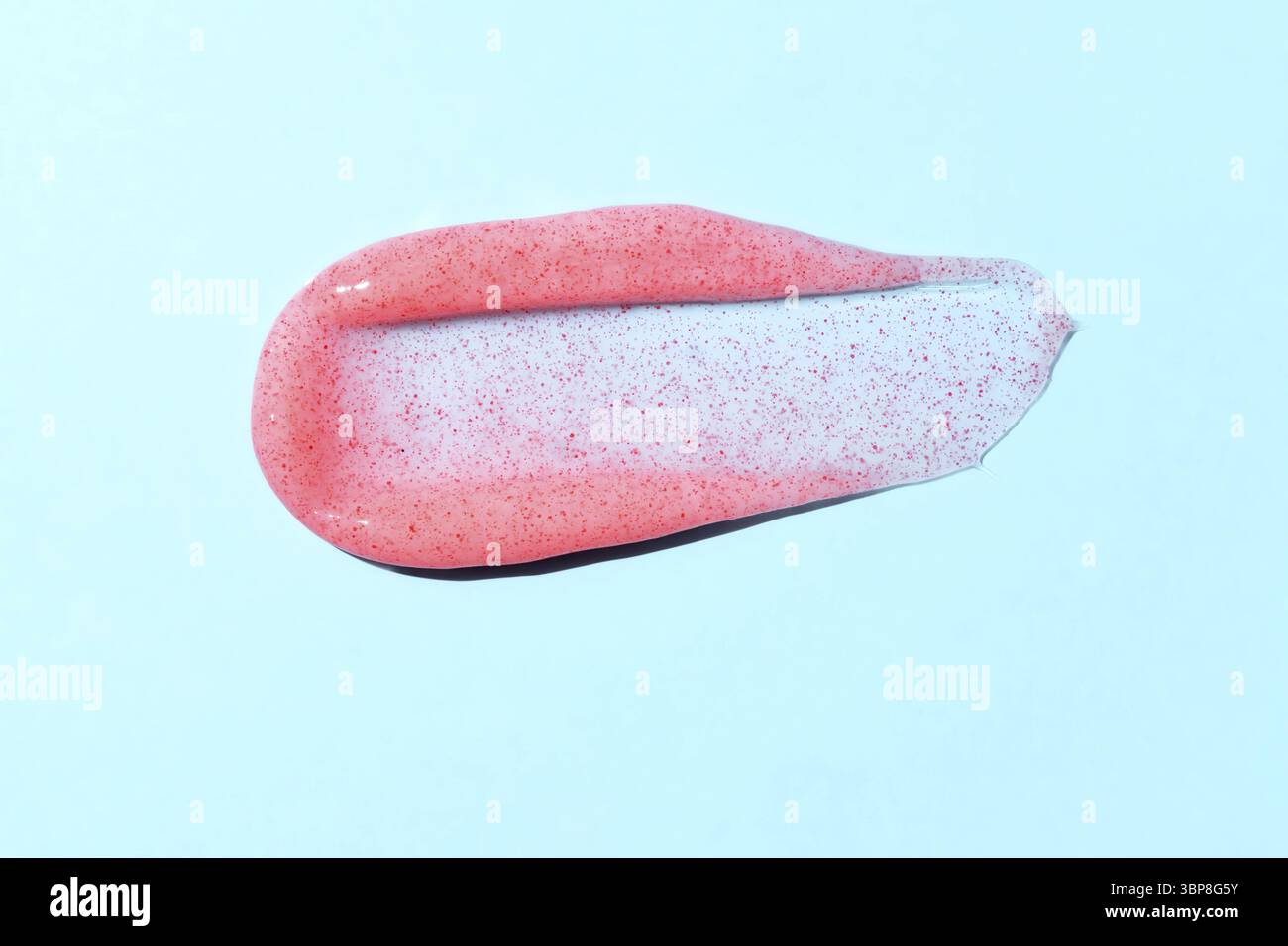 Scrub smear on blue background. Texture cosmetic scrub for face and ...