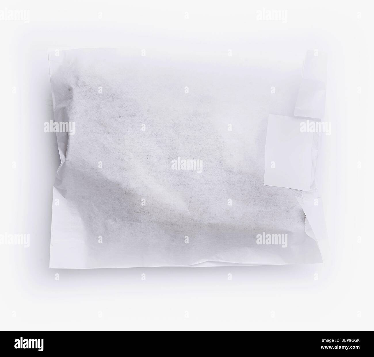 Food, Crumpled white paper bag with a blank label is laying on a white ...