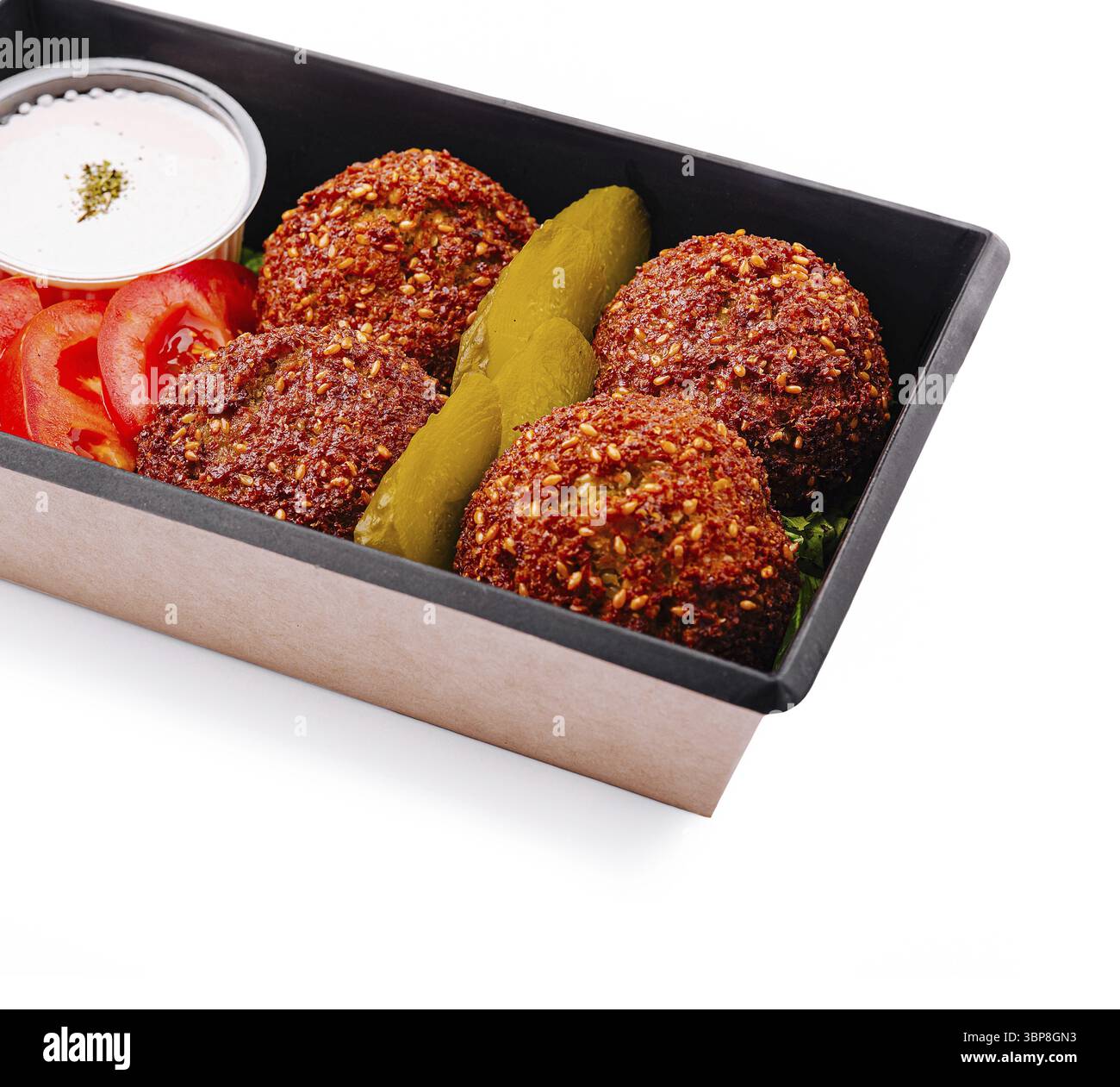 Food, A vibrant platter features crispy falafel balls alongside sliced ...
