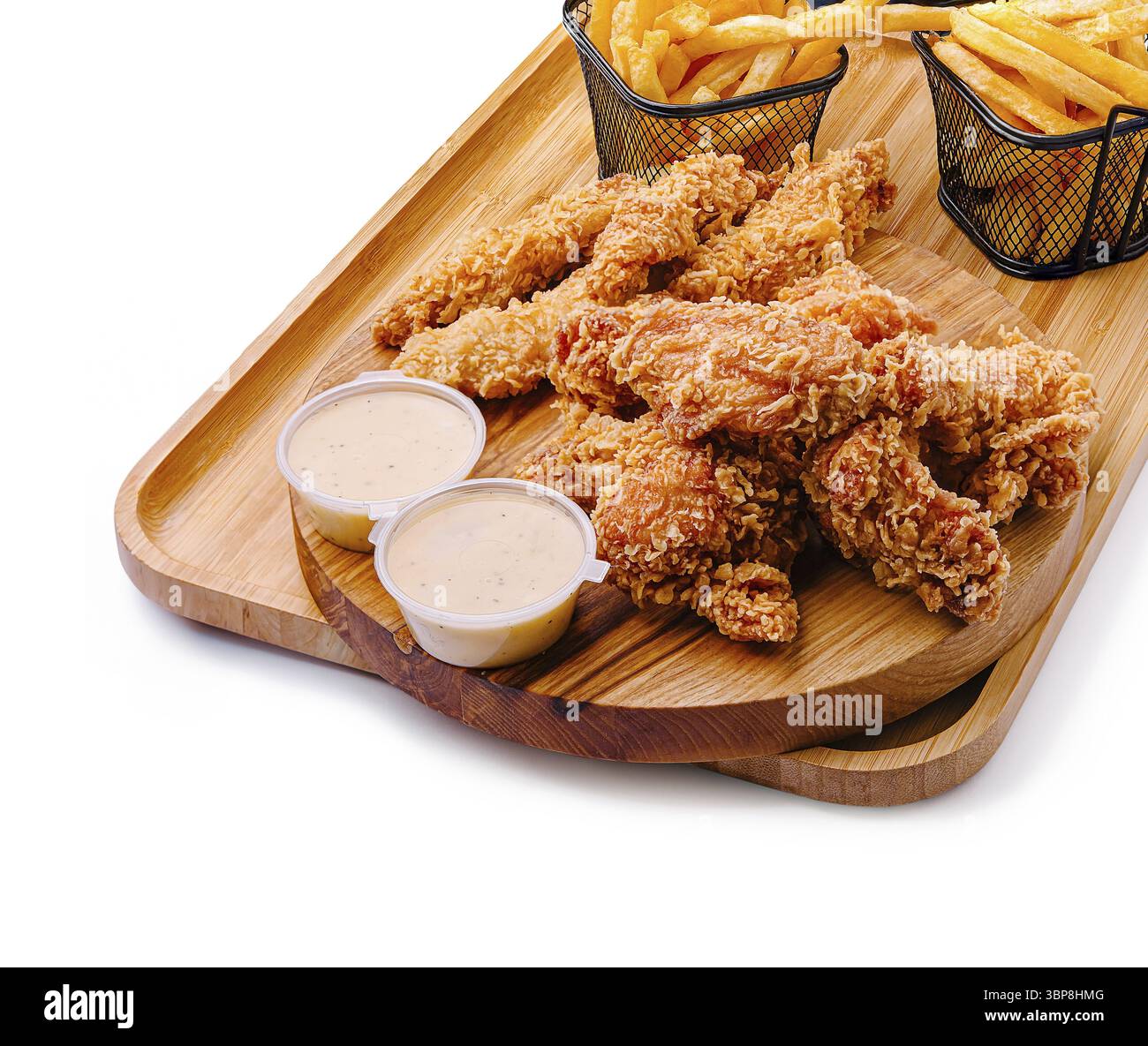 Food, A wooden tray displays a generous serving of crispy fried chicken ...