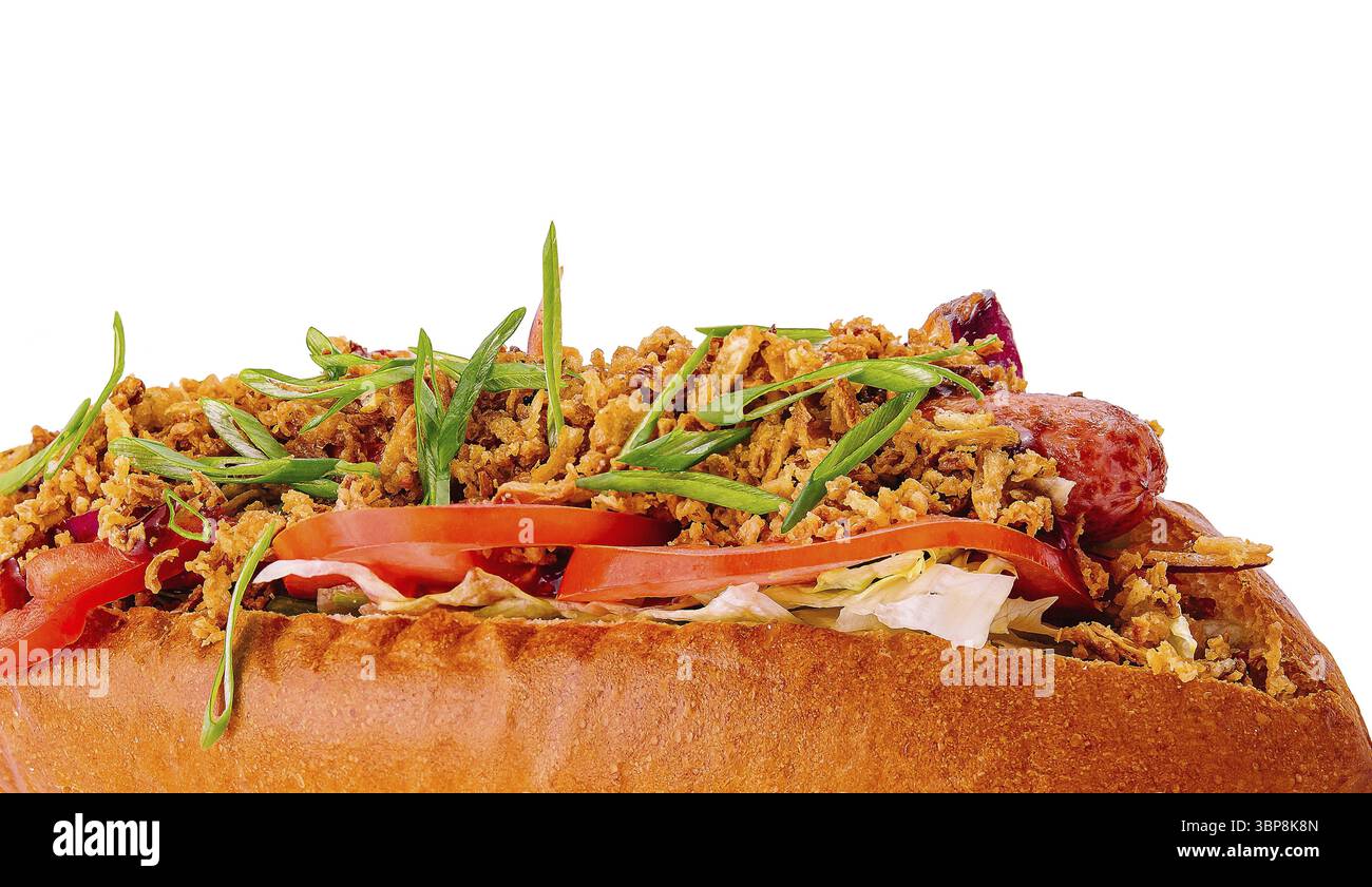 Food, Scrumptious hot dog loaded with assorted condiments, isolated on ...