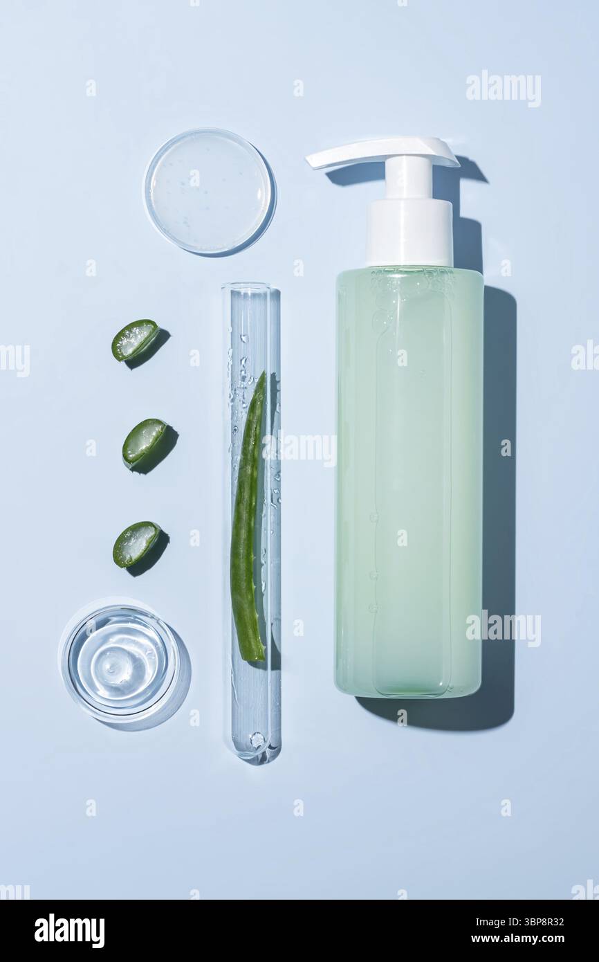 Petri dish with Aloe vera gel and soap and unlabeled pump bottle put on ...