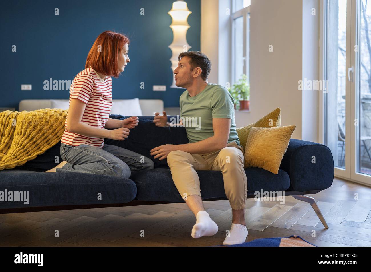Stressed European millennial couple quarreling arguing emotionally ...