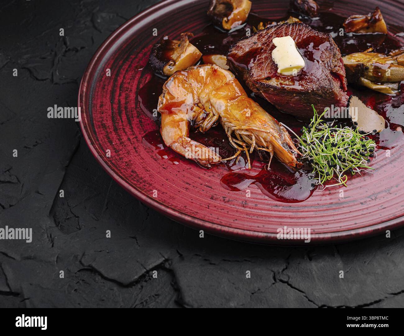 Food, A beautifully plated gourmet dish showcases a tender beef steak ...