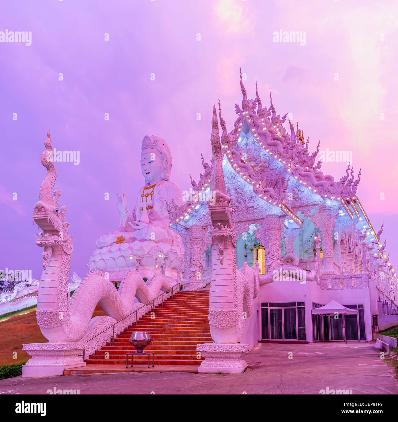 The Naga staircases to the white stucco Ordination Hall and Guan Yin ...