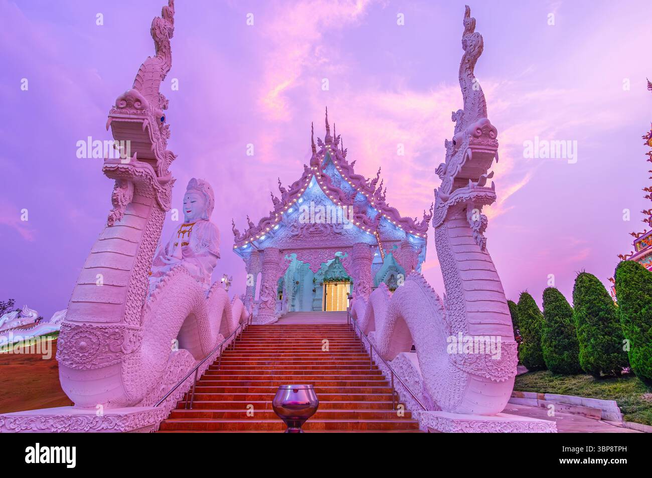 The Naga staircases to the white stucco Ordination Hall and Guan Yin ...