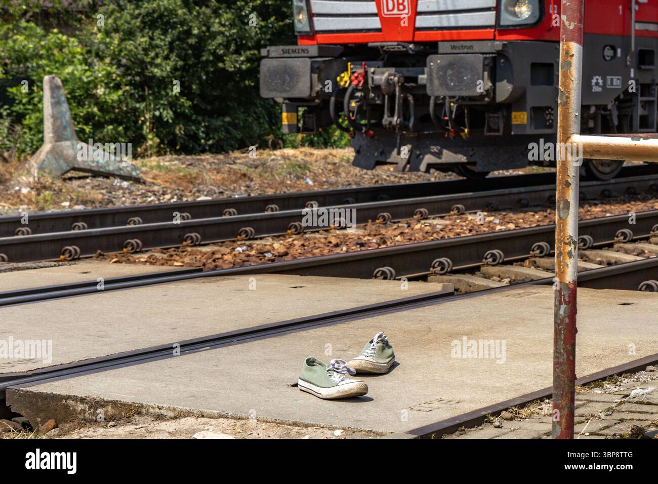 Accident scene on the tracks, train passing through an unguarded ...