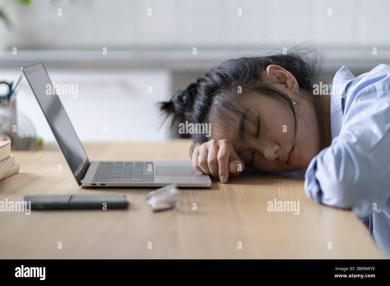 Female student taking nap hi-res stock photography and images - Alamy