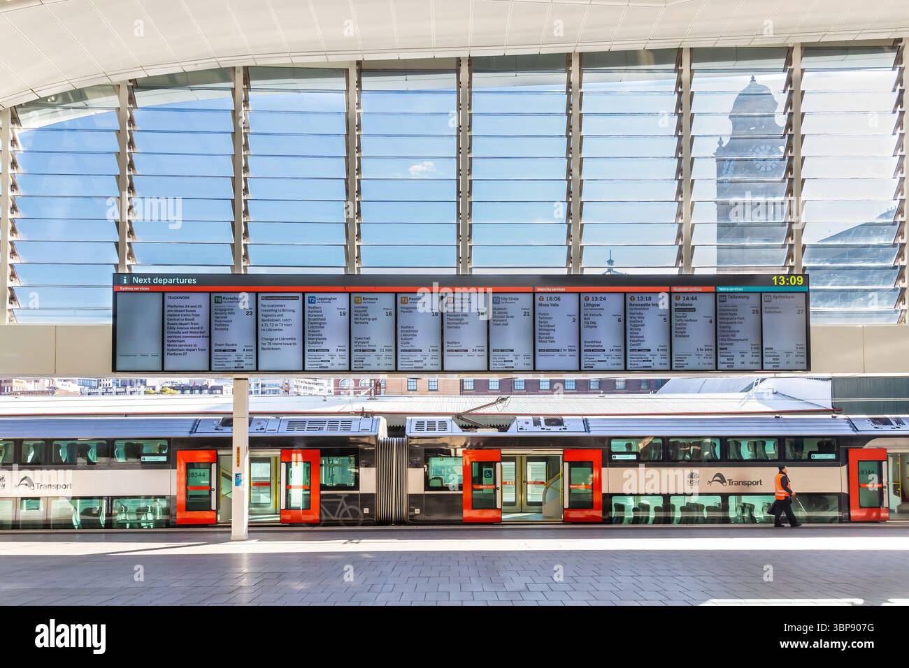 A mainline train at Central Station, Sydney, with destination boards ...