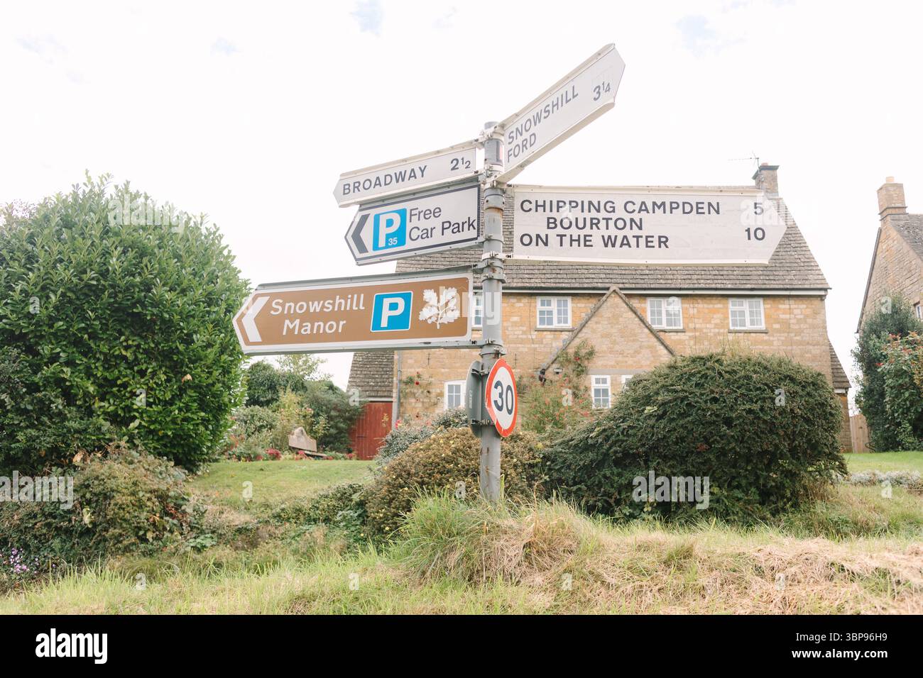 Cotswolds Village Road Sign with Directions Stock Photo - Alamy