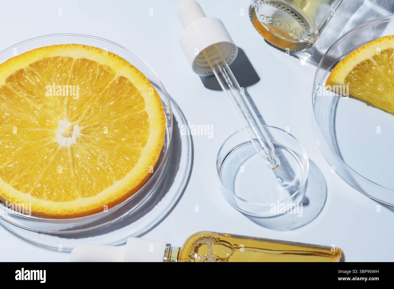 Cosmetic laboratory experiment and research with orange and ingredient ...