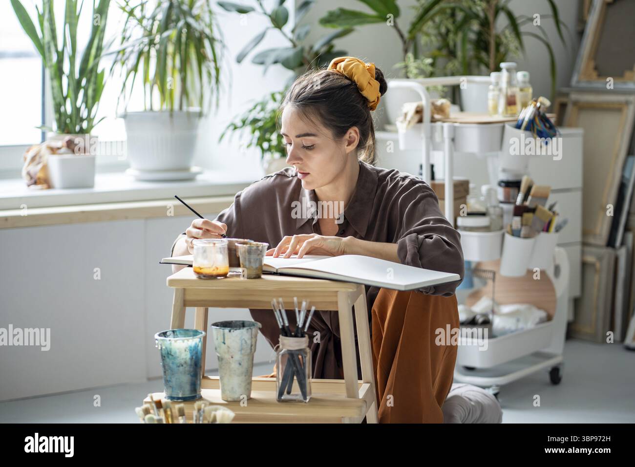 Focused female professional engaged hi-res stock photography and images ...