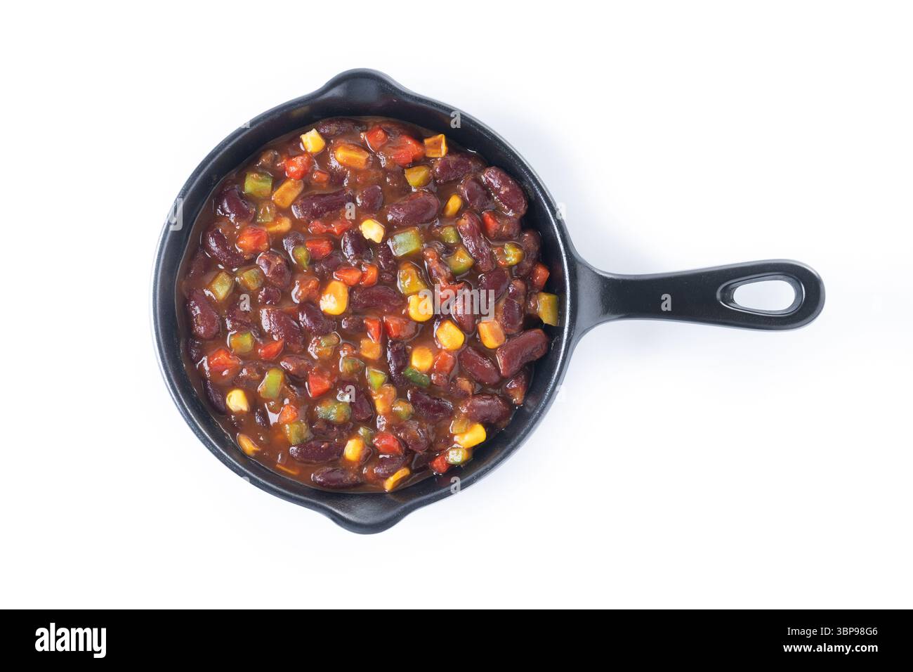 Mexican chilli beans with vegetables in iron pan isolated on white ...