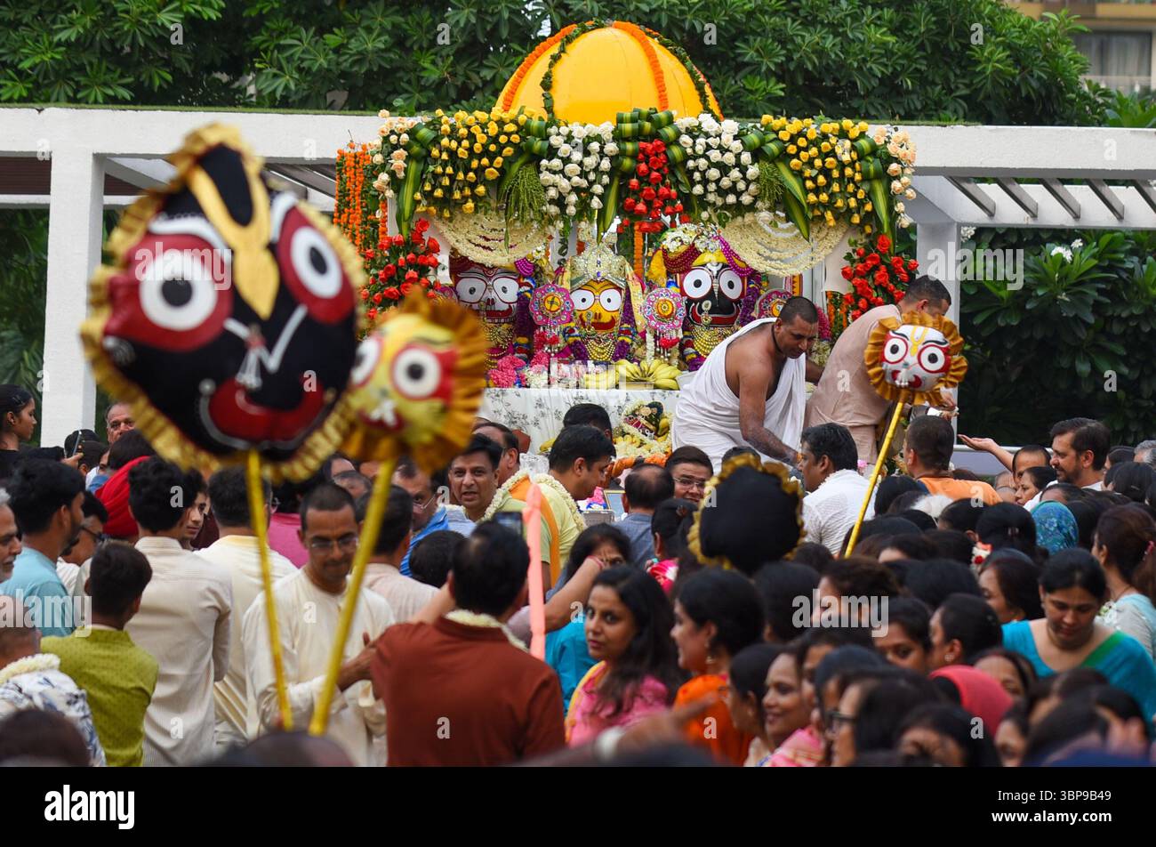 GURUGRAM, INDIA - JULY 6: Devotees pull chariot of Lord Jagannath, Lord ...