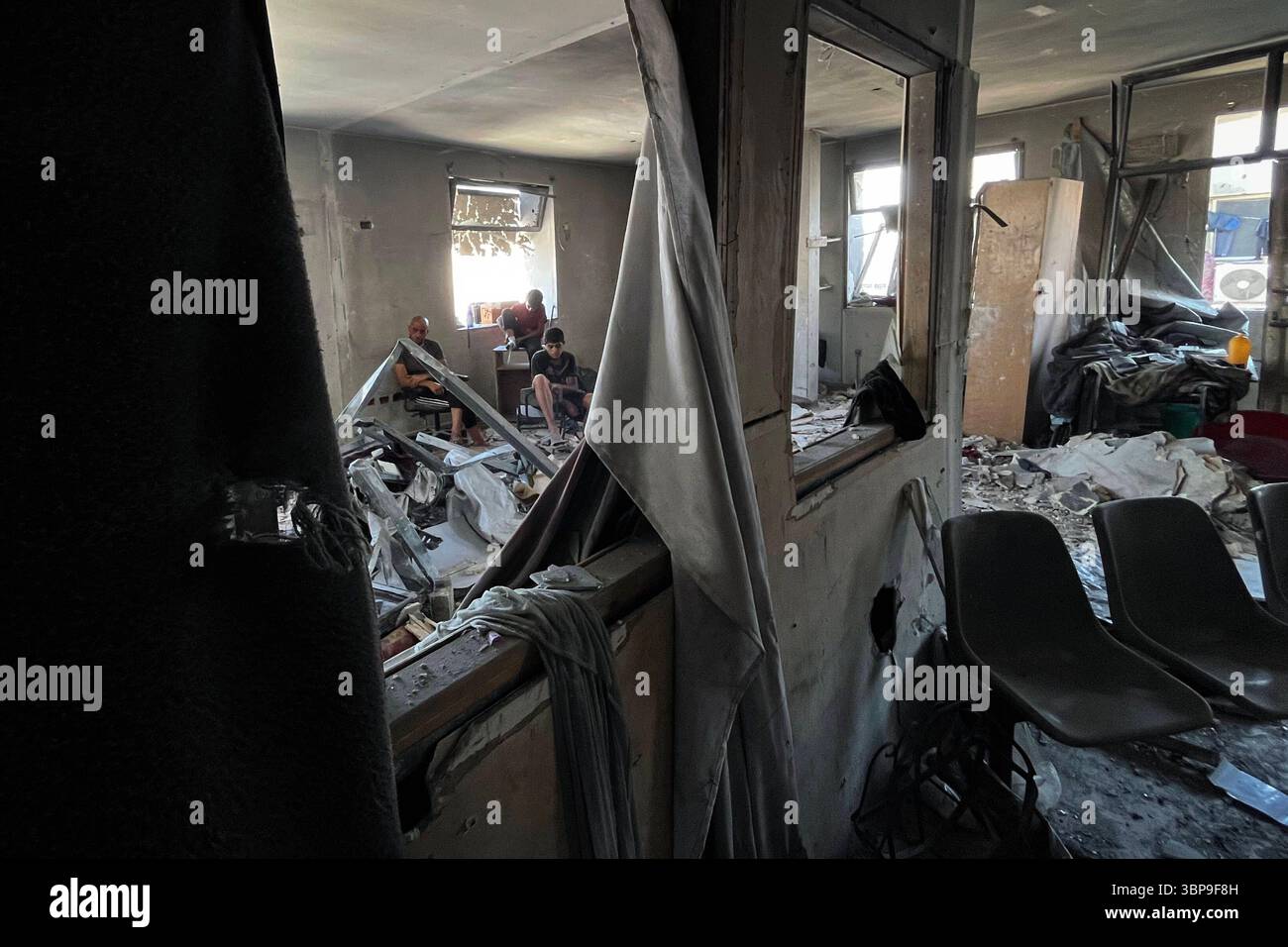 A view of damage at Rimal Clinic building A view of damage at Rimal ...