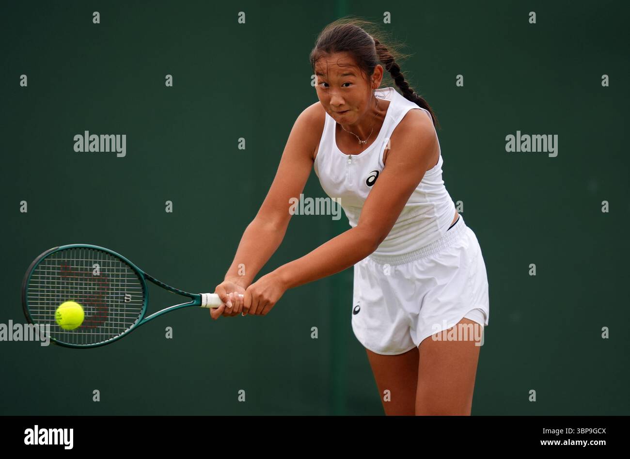 Yushan Shao during her Girls' Singles match against Charo Esquiva ...