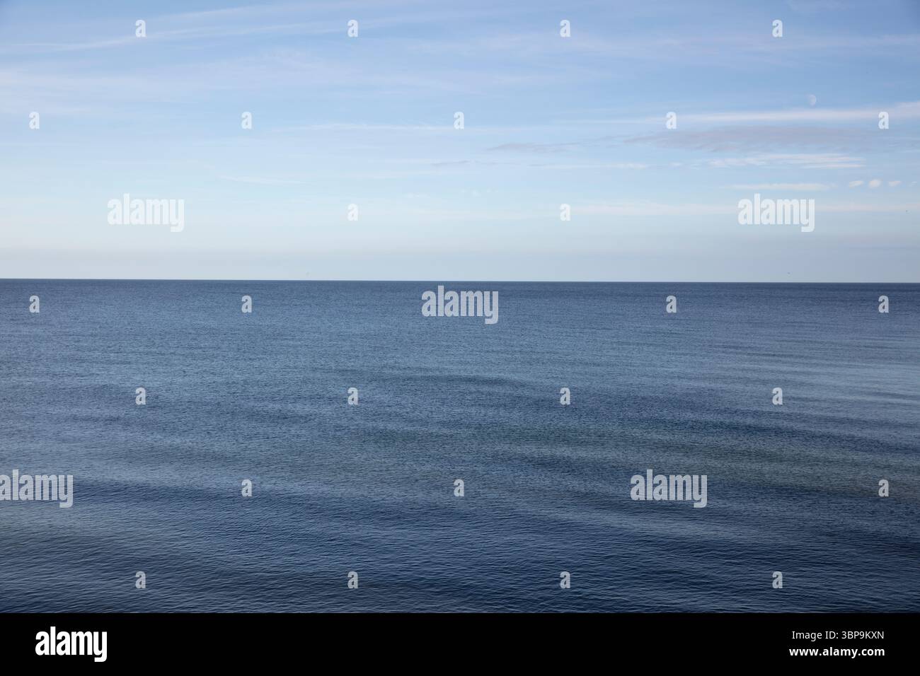 Blue seascape clear sky calm hi-res stock photography and images - Alamy