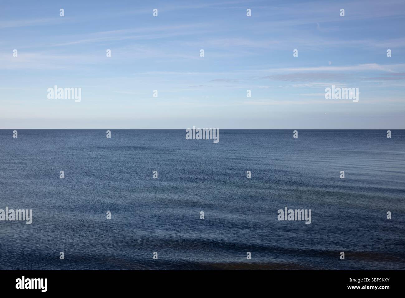 Blue seascape clear sky calm hi-res stock photography and images - Alamy