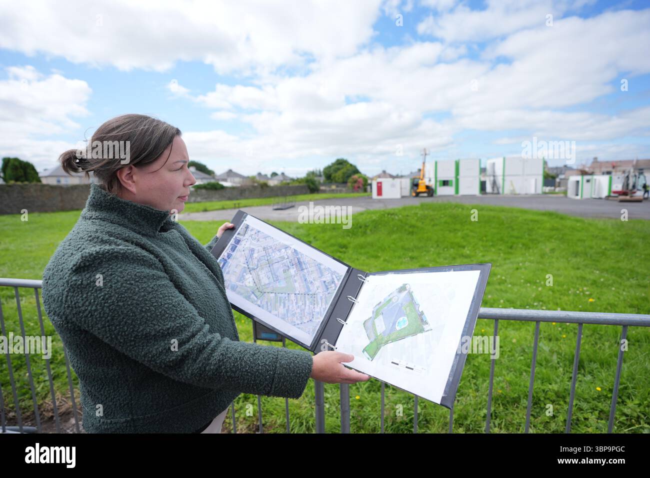Dr Niamh McCullagh points to a map of the excavation site, while at the ...