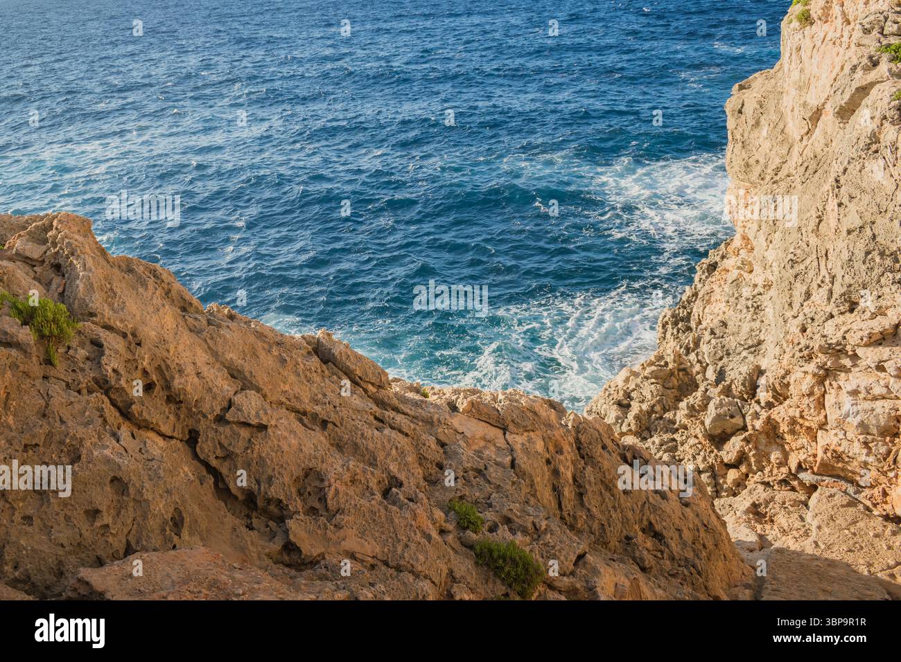 View of the blue sea from a cliff. Greek landscape in Crete Stock Photo ...