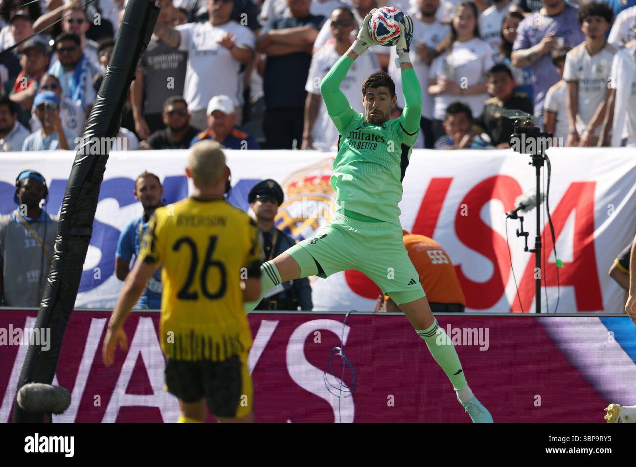 GK Thibout Courtois (10) of Real Madrid C.F. leaps to catch the ball ...
