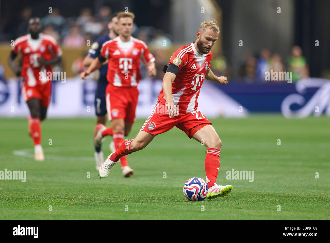 FC Bayern Munich midfielder Konrad Laimer (27) kicks the ball during ...
