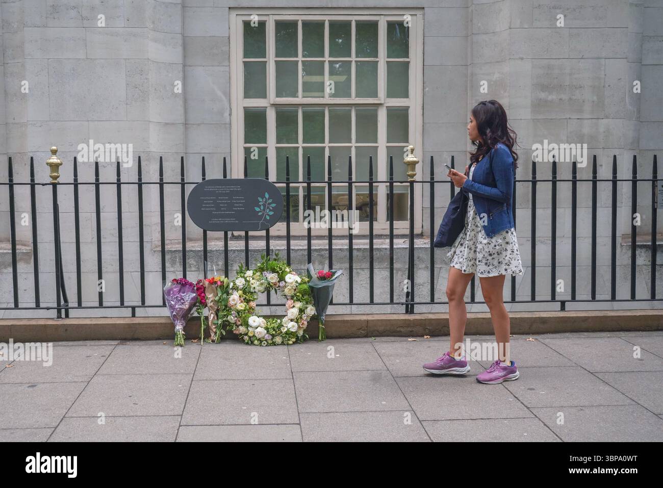 London, UK 7 July 2025.Flowers and wreaths are laid at the memorial to ...