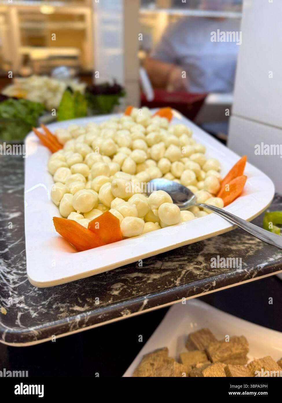 Fresh mozzarella cheese served at self-service buffet, all-inclusive ...