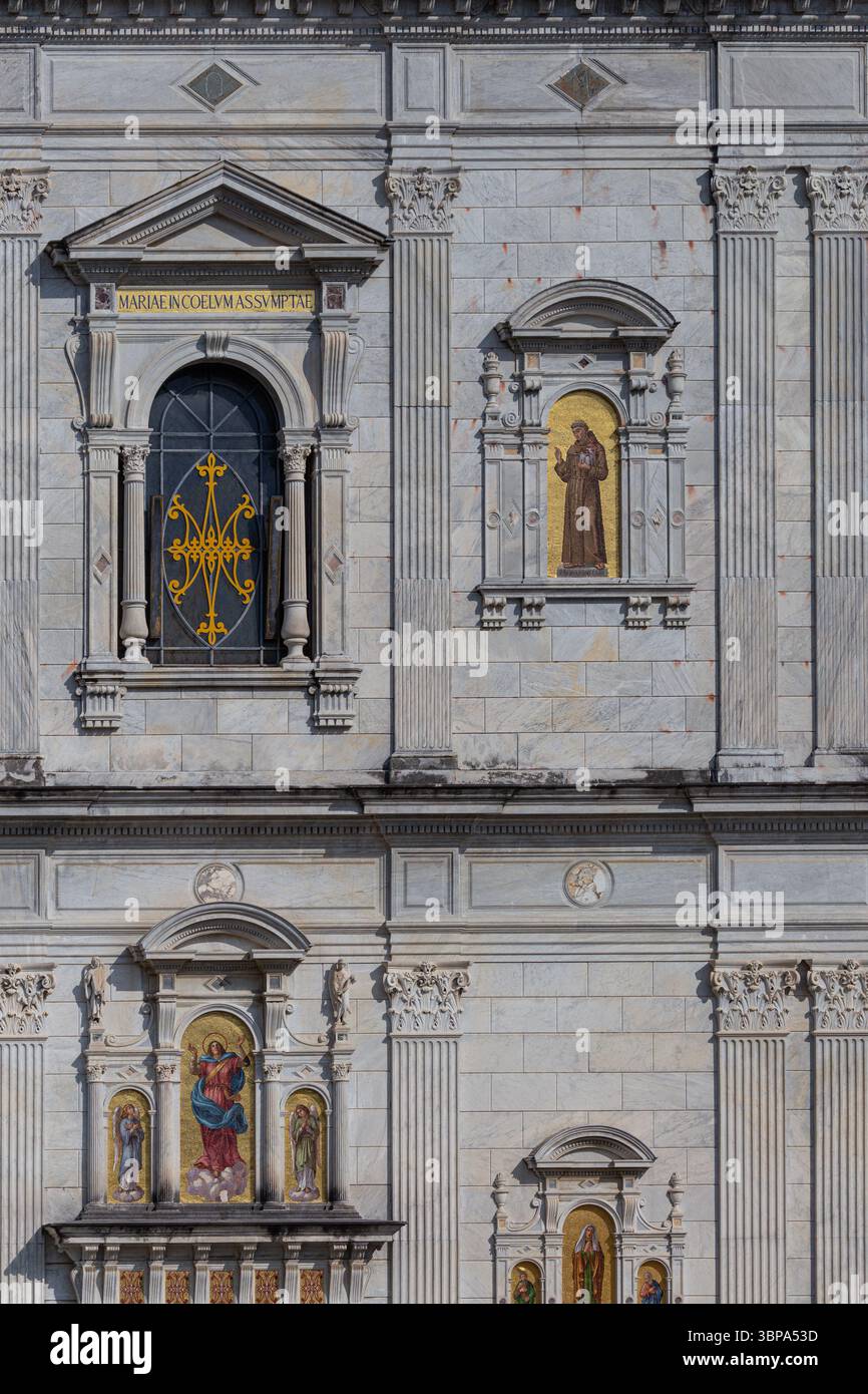 Historic Church Facade with Ornate Reliefs and Religious Iconography ...