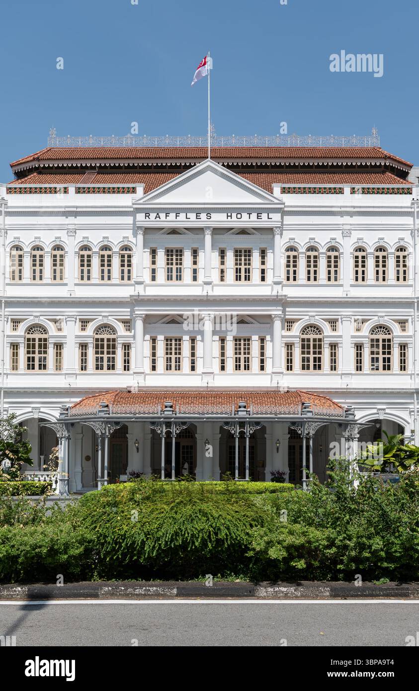Singapore flag flying over The Raffles Hotel on Beach Road, Singapore ...