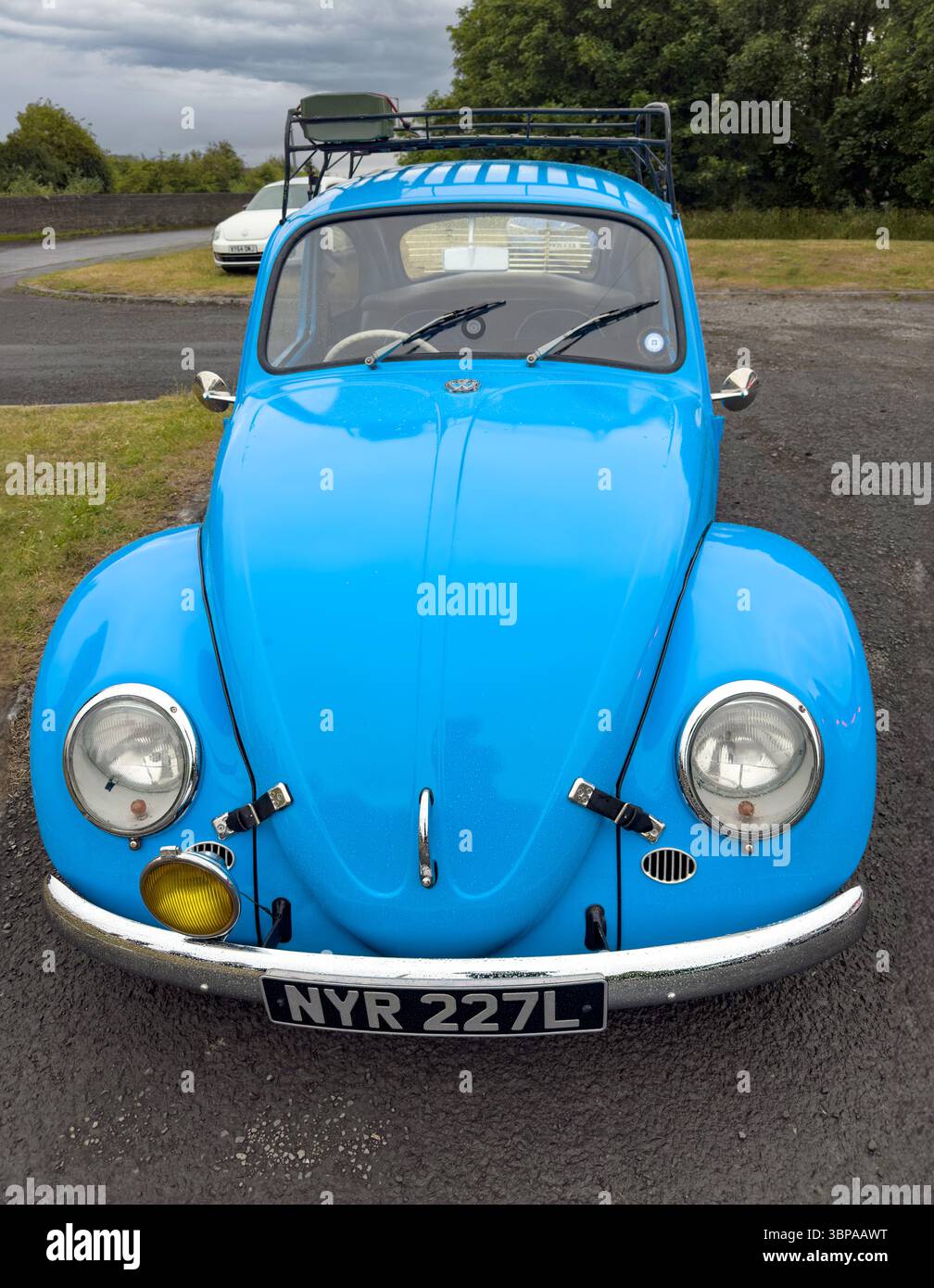 Vintage blue Type 1 original Volkswagen Beetle parked on a suburban ...