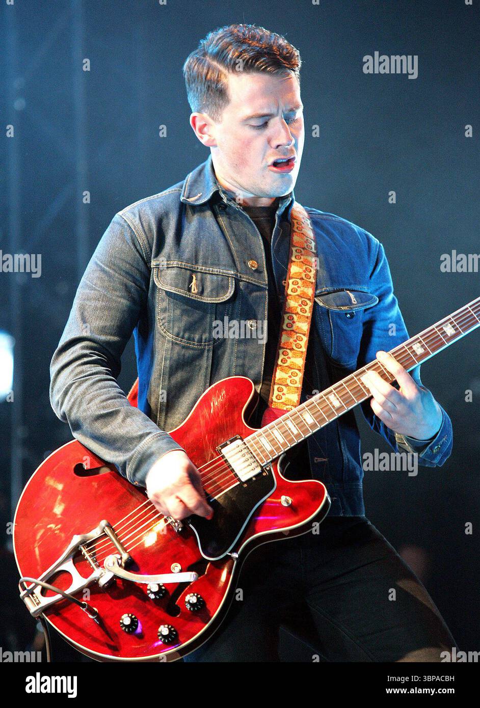 Jamie Cook of the Arctic Monkeys perform at Don Valley Bowl in ...