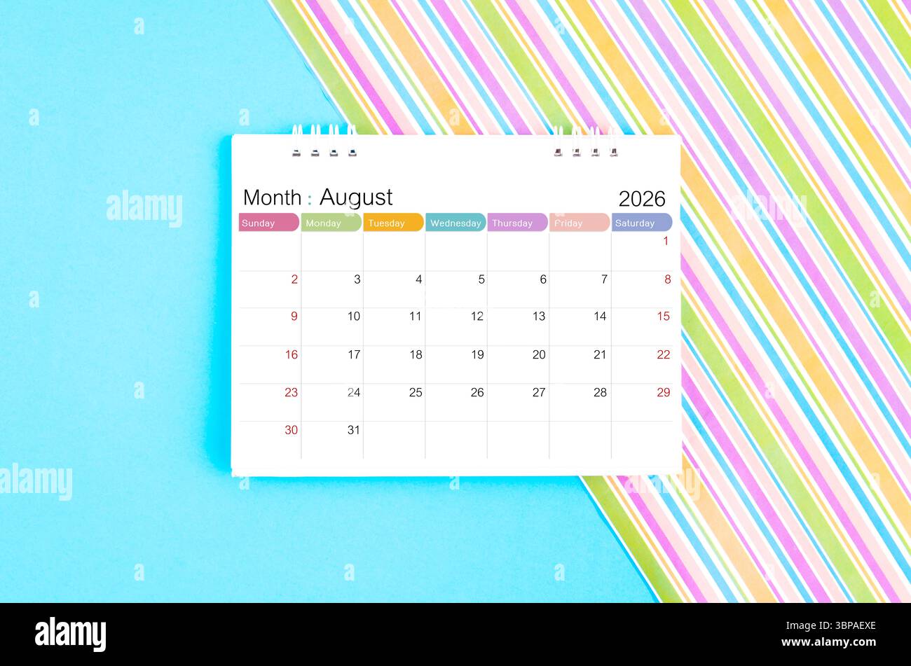 August 2026 desk calendar on blue and rainbow background Stock Photo ...