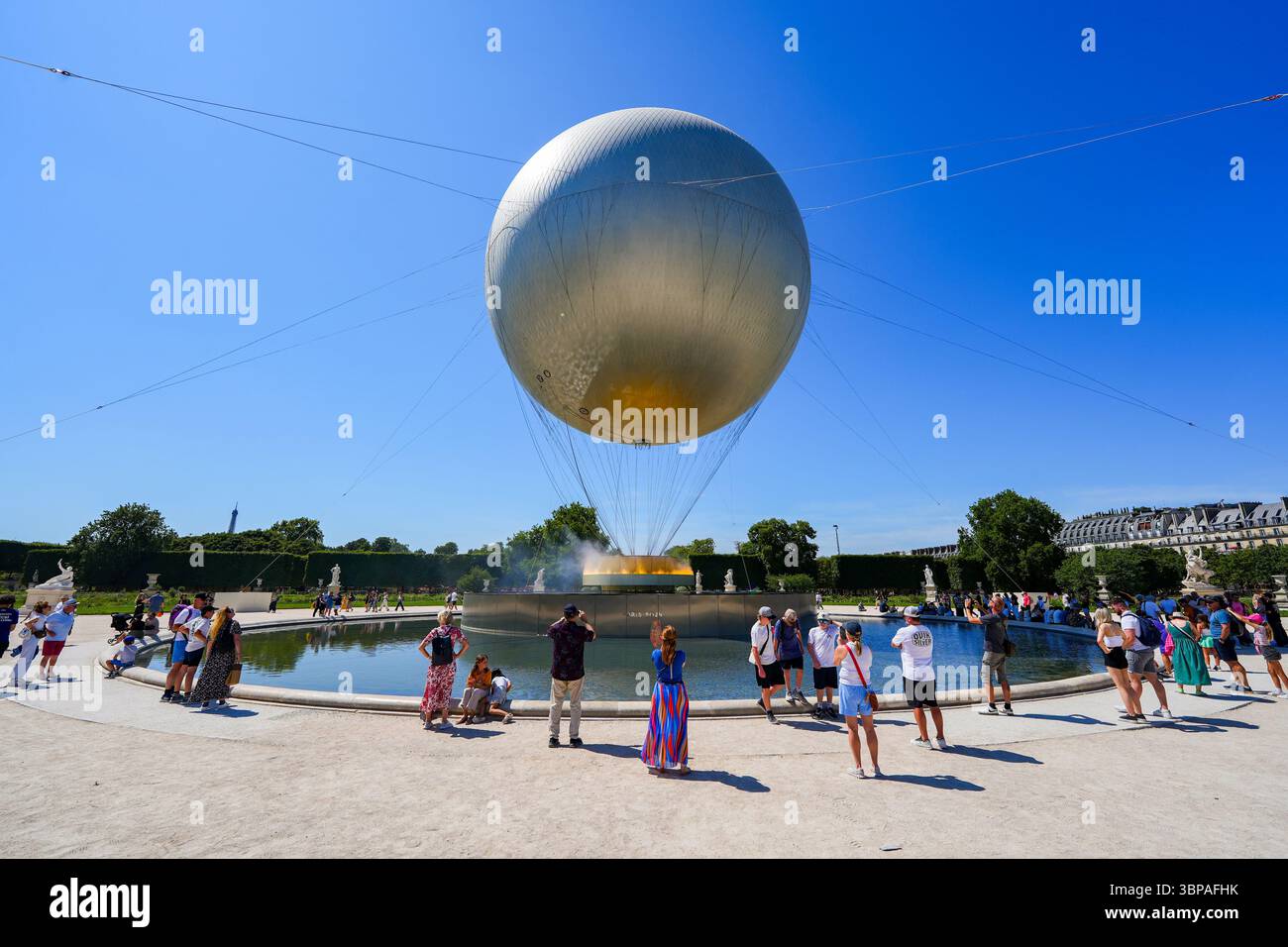 Olympic Cauldron suspended under a silver tethered balloon in the ...