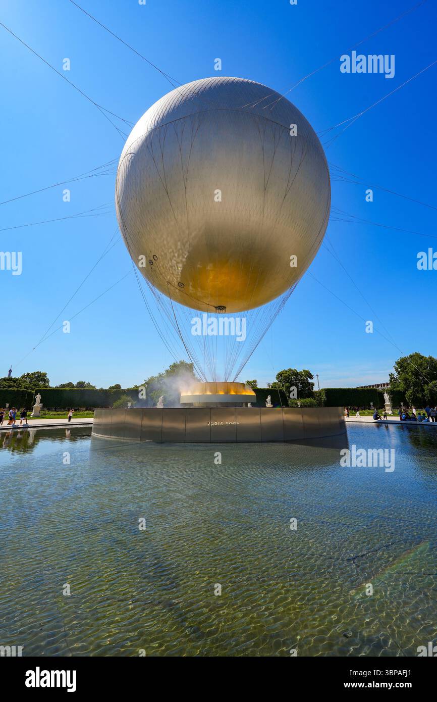 Olympic Cauldron suspended under a silver tethered balloon in the ...