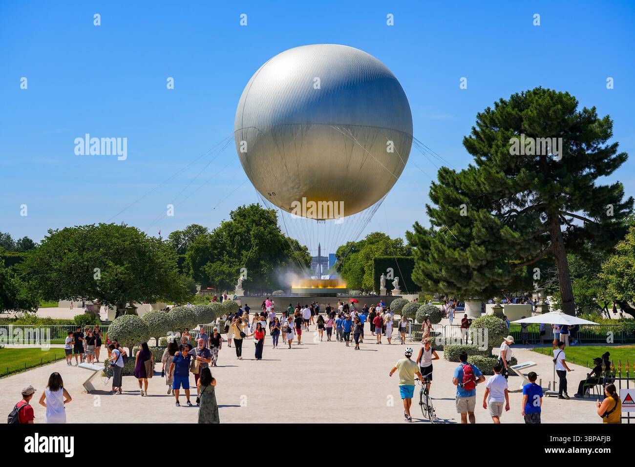 Olympic Cauldron suspended under a silver tethered balloon in the ...