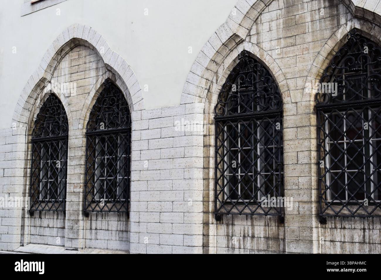 Gothic Arch Windows with Wrought Iron Grates in Tallinn Old Town Stock ...