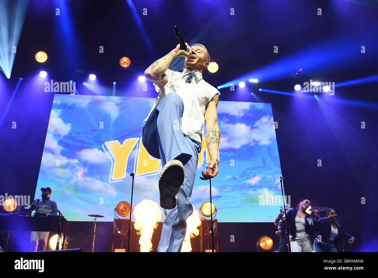 LONDON, ENGLAND - APRIL 12: Macklemore (Benjamin Haggerty) performing ...