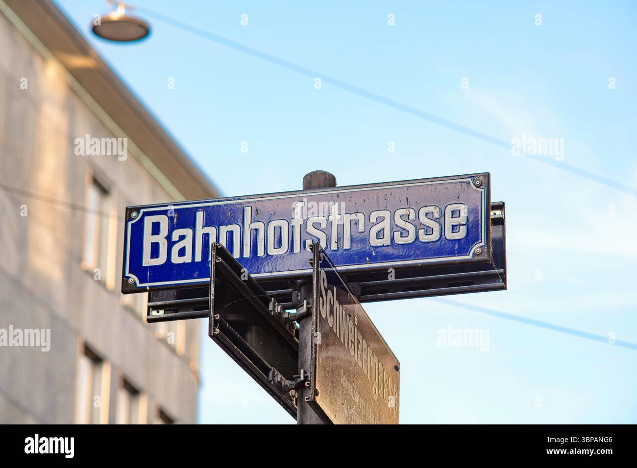 05-07-2025 Zurich, Switzerland. Bahnhofstrasse street sign. Looking up ...