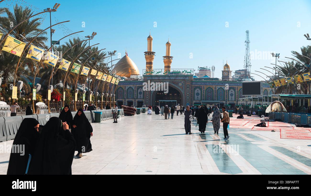 Visitors gather at the holy shrine in Karbala, Iraq, enjoying a vibrant ...