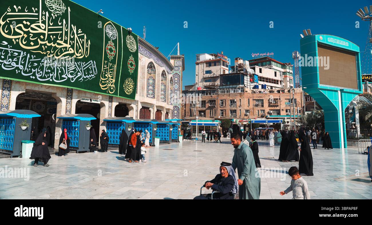 Crowds gather in Karbala Iraq, as families and faithful congregate at a ...