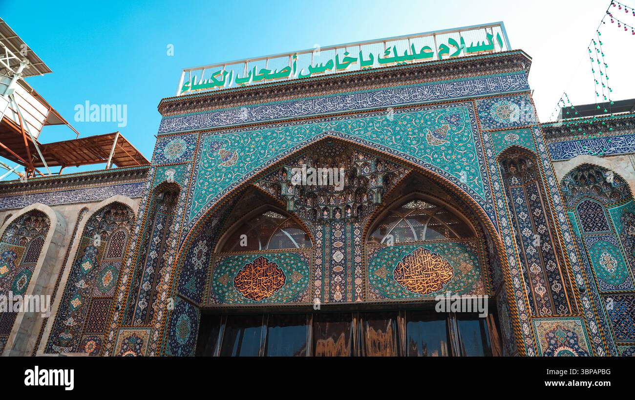 Tourists and pilgrims admire the intricate architecture of the Imam ...