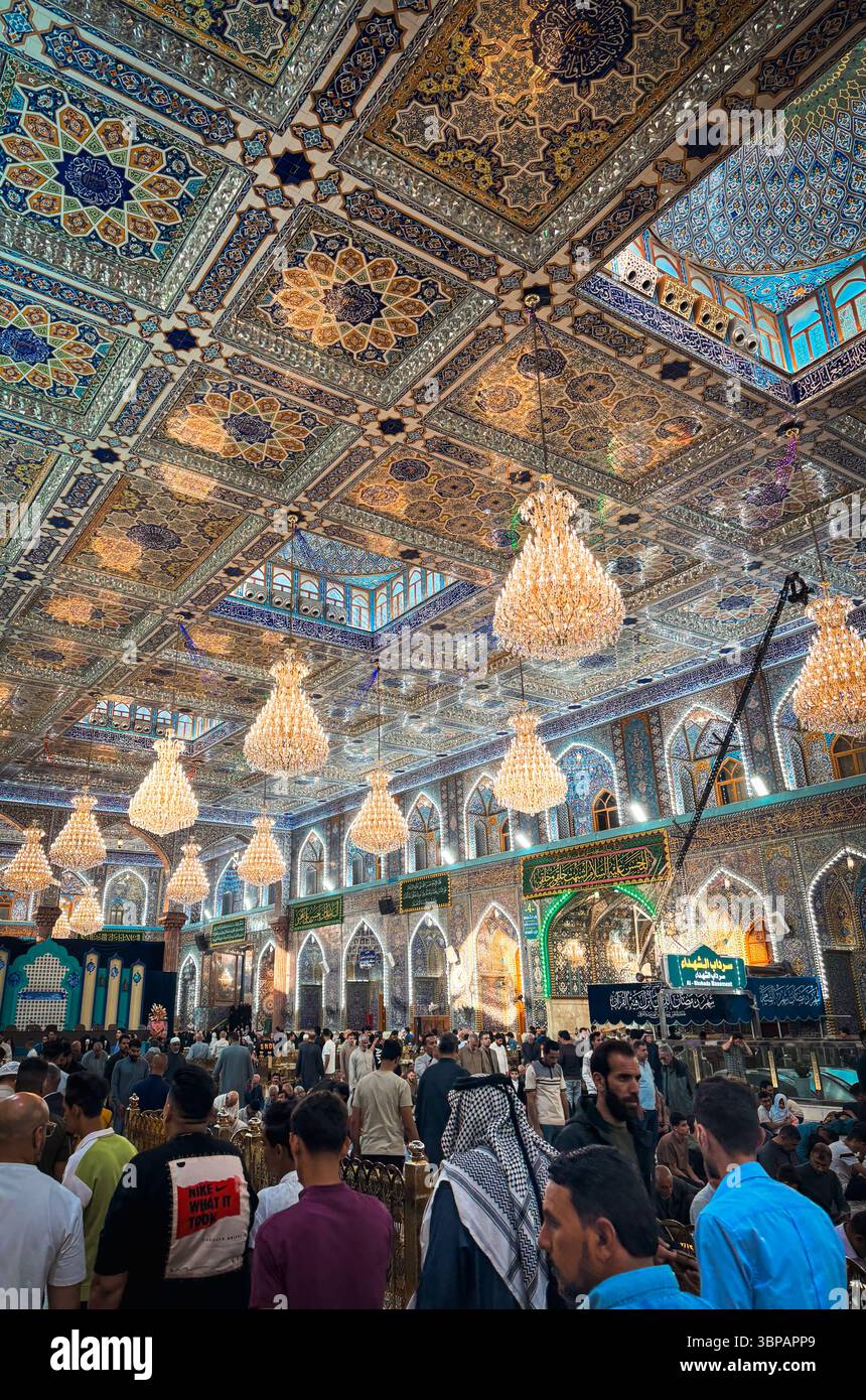 A multitude of people gathers in the Imam Hussein shrine, appreciating ...