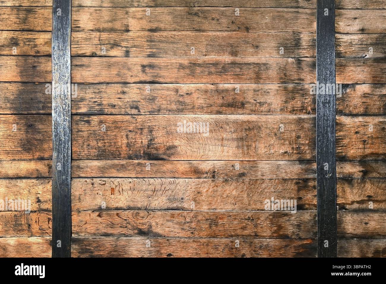 Rustic wooden planks with black metal iron stripes for vintage ...